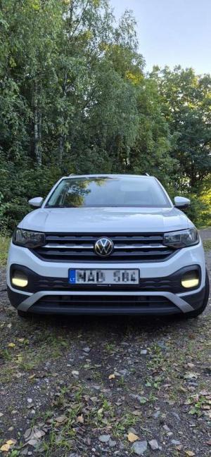 White Volkswagen T-Cross 2021 in Prienai, with an engine capacity of 1.00 L and mileage of 216 thousand km for 12200 €, photo 3 on AUTOMOTO.COM.LV