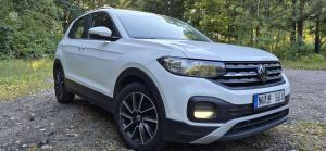 White Volkswagen T-Cross 2021 in Prienai, with an engine capacity of 1.00 L and mileage of 216 thousand km for 12200 €, photo 4 on AUTOMOTO.COM.LV