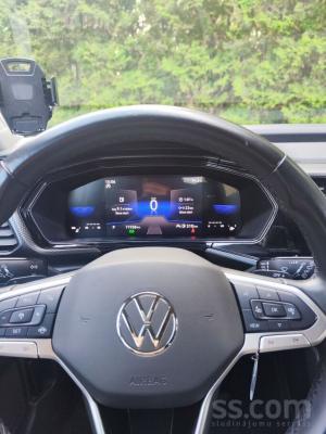 White Volkswagen T-Cross 2023 in Riga, with an engine capacity of 1.00 L and mileage of 72 thousand km for 17400 €, photo 9 on AUTOMOTO.COM.LV
