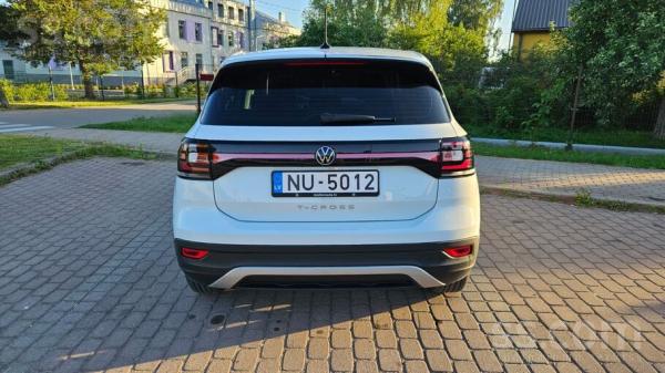Balts Volkswagen T-Cross 2024 Jelgava, ar dzinēja tilpumu 1.00 L un nobraukumu 33 tūkst. km par 16700 €, foto  vietnē AUTOMOTO.COM.LV