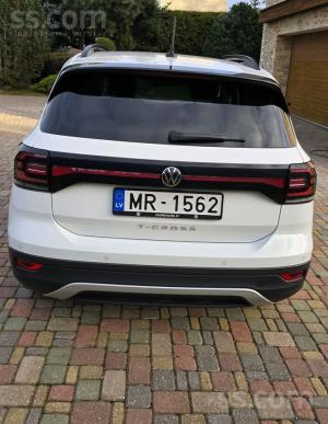 White Volkswagen T-Cross 2020 in Riga, with an engine capacity of 1.00 L and mileage of 73 thousand km for 15450 €, photo 12 on AUTOMOTO.COM.LV
