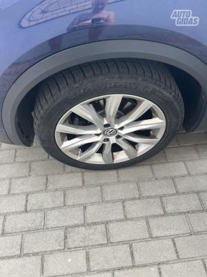 Blue Volkswagen T-Roc 2019 in Kaunas, with an engine capacity of 2.00 L and mileage of 174 thousand km for 18700 €, photo 7 on AUTOMOTO.COM.LV