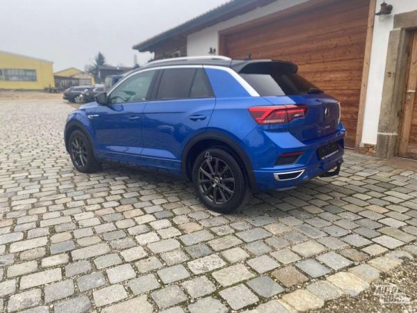 Blue Volkswagen T-Roc 2021 in Kaunas, with an engine capacity of 1.50 L and mileage of 59 thousand km for 25387 €, photo 2 on AUTOMOTO.COM.LV