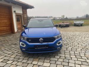 Blue Volkswagen T-Roc 2021 in Kaunas, with an engine capacity of 1.50 L and mileage of 59 thousand km for 25387 €, photo 3 on AUTOMOTO.COM.LV