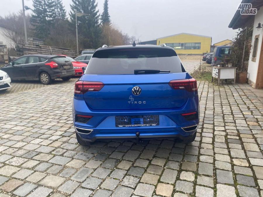 Blue Volkswagen T-Roc 2021 in Kaunas, with an engine capacity of 1.50 L and mileage of 59 thousand km for 25387 €, photo 4 on AUTOMOTO.COM.LV