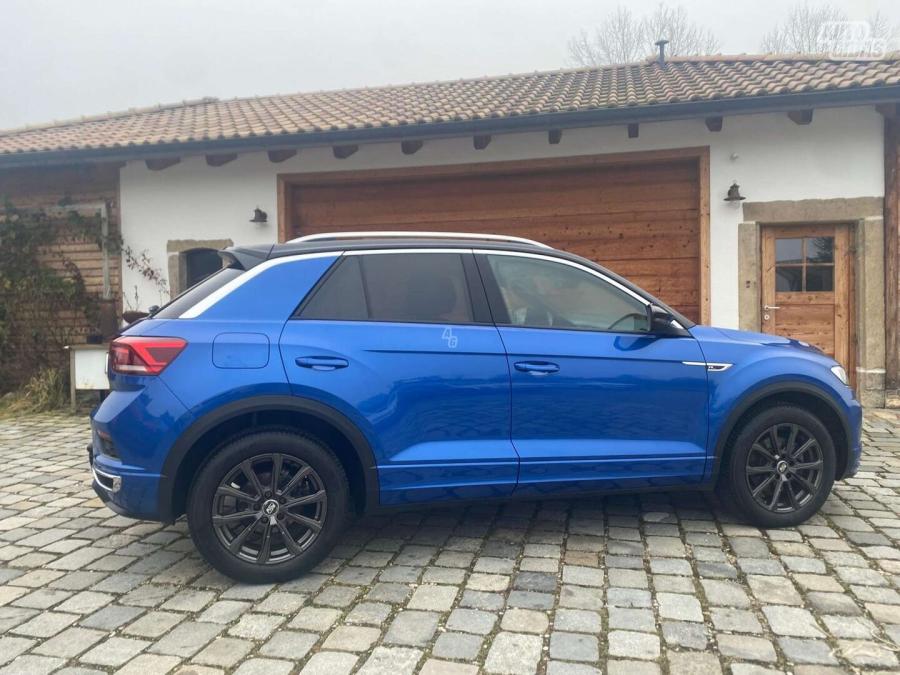 Blue Volkswagen T-Roc 2021 in Kaunas, with an engine capacity of 1.50 L and mileage of 59 thousand km for 25387 €, photo 14 on AUTOMOTO.COM.LV