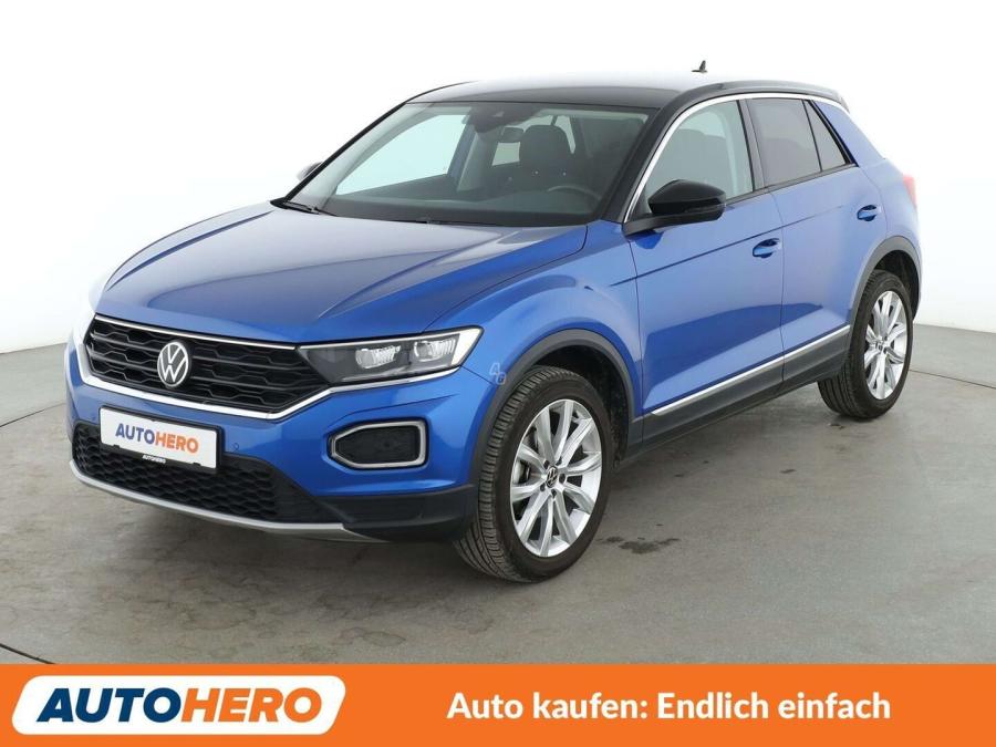 Blue Volkswagen T-Roc 2021 in Kaunas, with an engine capacity of 1.50 L and mileage of 29 thousand km for 28261 €, photo 1 on AUTOMOTO.COM.LV