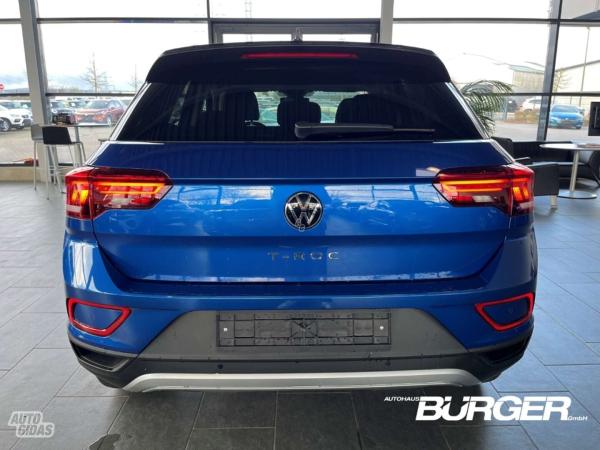 Blue Volkswagen T-Roc 2024 in Kaunas, with an engine capacity of 1.50 L and mileage of 12 thousand km for 30609 €, photo 5 on AUTOMOTO.COM.LV