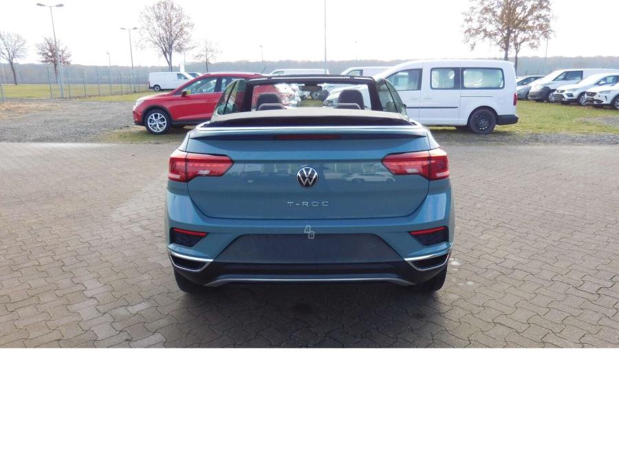 Green Volkswagen T-Roc 2021 in Kaunas, with an engine capacity of 1.00 L and mileage of 26 thousand km for 22735 €, photo 5 on AUTOMOTO.COM.LV