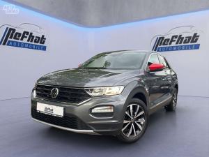 Grey Volkswagen T-Roc 2021 in Kaunas, with an engine capacity of 1.50 L and mileage of 63 thousand km for 23379 €, photo  on AUTOMOTO.COM.LV