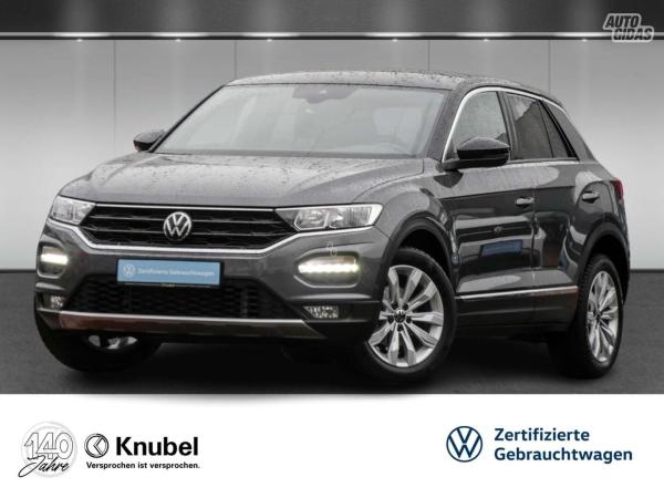 Grey Volkswagen T-Roc 2021 in Kaunas, with an engine capacity of 1.50 L and mileage of 32 thousand km for 27426 €, photo 1 on AUTOMOTO.COM.LV