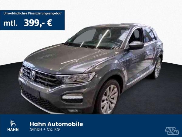 Grey Volkswagen T-Roc 2021 in Kaunas, with an engine capacity of 1.50 L and mileage of 26 thousand km for 27909 €, photo 1 on AUTOMOTO.COM.LV