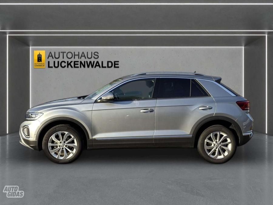 Grey Volkswagen T-Roc 2023 in Kaunas, with an engine capacity of 1.50 L and mileage of 27 thousand km for 29959 €, photo 4 on AUTOMOTO.COM.LV