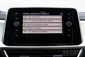 Grey Volkswagen T-Roc 2023 in Riga, with an engine capacity of 1.50 L and mileage of 143 thousand km for 19950 €, photo 14 on AUTOMOTO.COM.LV