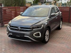 Grey Volkswagen T-Roc 2023 in Siauliai, with an engine capacity of 1.97 L and mileage of 181 thousand km for 17990 €, photo  on AUTOMOTO.COM.LV
