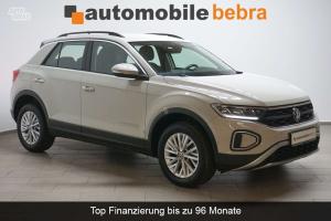Grey Volkswagen T-Roc 2024 in Kaunas, with an engine capacity of 1.50 L and mileage of 31 thousand km for 24965 €, photo 3 on AUTOMOTO.COM.LV