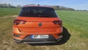 Orange Volkswagen T-Roc 2020 in Liepaja, with an engine capacity of 1.50 L and mileage of 24 thousand km for 19500 €, photo 6 on AUTOMOTO.COM.LV