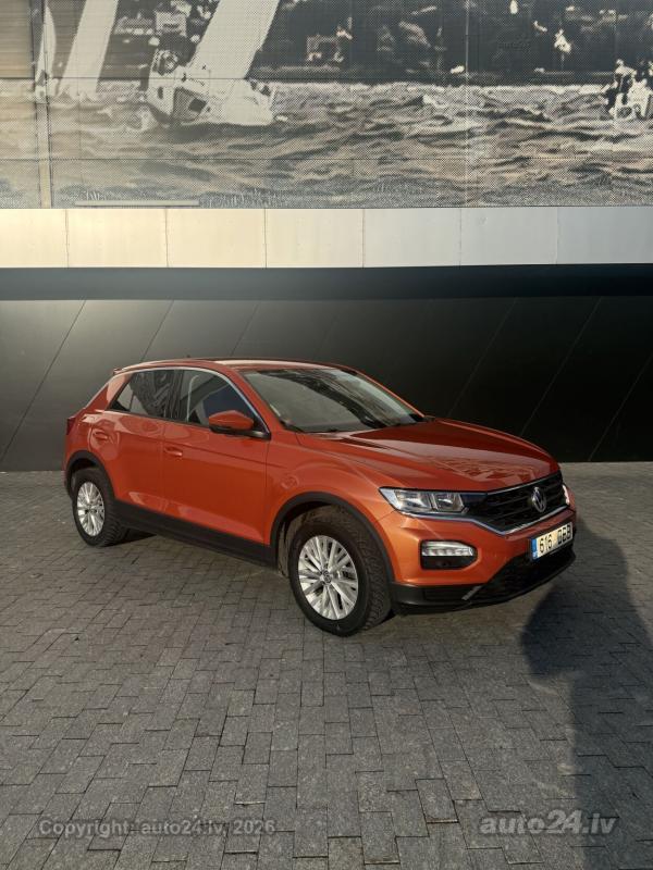 Orange Volkswagen T-Roc 2019 in Tallinn, with an engine capacity of 1.00 L and mileage of 133 thousand km for 13700 €, photo 5 on AUTOMOTO.COM.LV