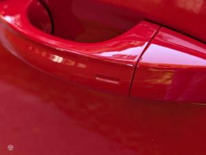 Red Volkswagen T-Roc 2021 in Taurage, with an engine capacity of 1.50 L and mileage of 70 thousand km for 17700 €, photo 17 on AUTOMOTO.COM.LV