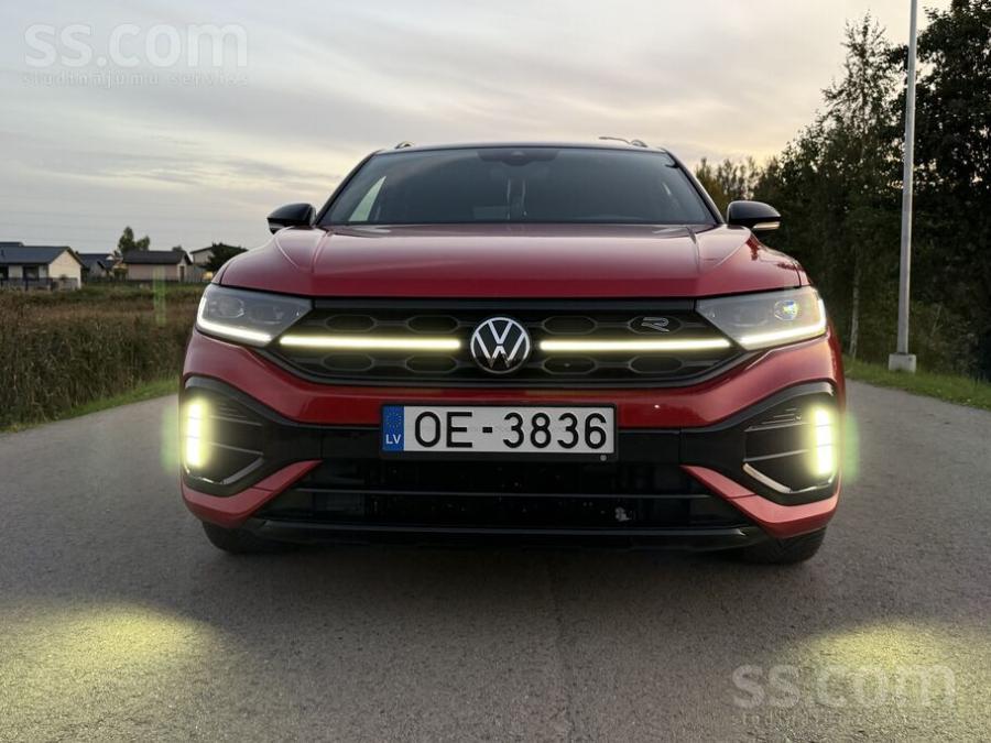 Red Volkswagen T-Roc 2023 in Riga, with an engine capacity of 2.00 L and mileage of 58 thousand km for 26999 €, photo 1 on AUTOMOTO.COM.LV