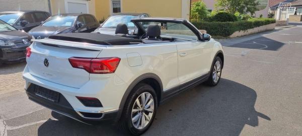 White Volkswagen T-Roc 2021 in Kaunas, with an engine capacity of 1.50 L and mileage of 28 thousand km for 25480 €, photo 5 on AUTOMOTO.COM.LV