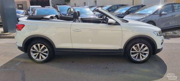 White Volkswagen T-Roc 2021 in Kaunas, with an engine capacity of 1.50 L and mileage of 28 thousand km for 25480 €, photo 6 on AUTOMOTO.COM.LV