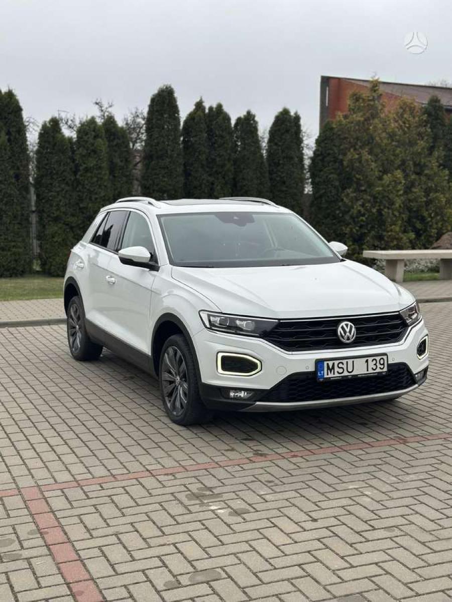 White Volkswagen T-Roc 2019 in Kaunas, with an engine capacity of 1.50 L and mileage of 257 thousand km for 15200 €, photo 2 on AUTOMOTO.COM.LV