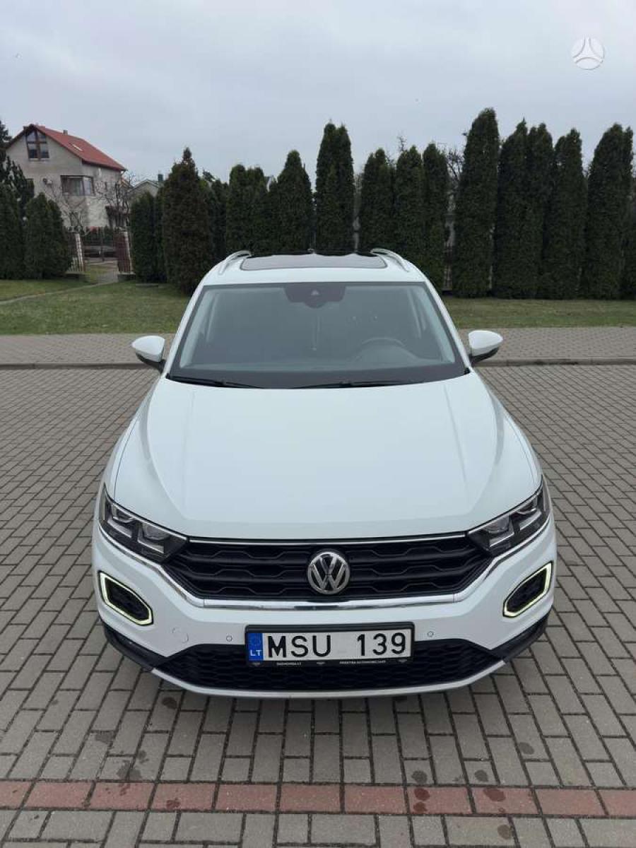 White Volkswagen T-Roc 2019 in Kaunas, with an engine capacity of 1.50 L and mileage of 257 thousand km for 15200 €, photo 4 on AUTOMOTO.COM.LV