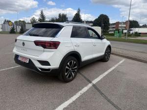 White Volkswagen T-Roc 2020 in Panevezys, with an engine capacity of 1.50 L and mileage of 154 thousand km for 16900 €, photo 5 on AUTOMOTO.COM.LV