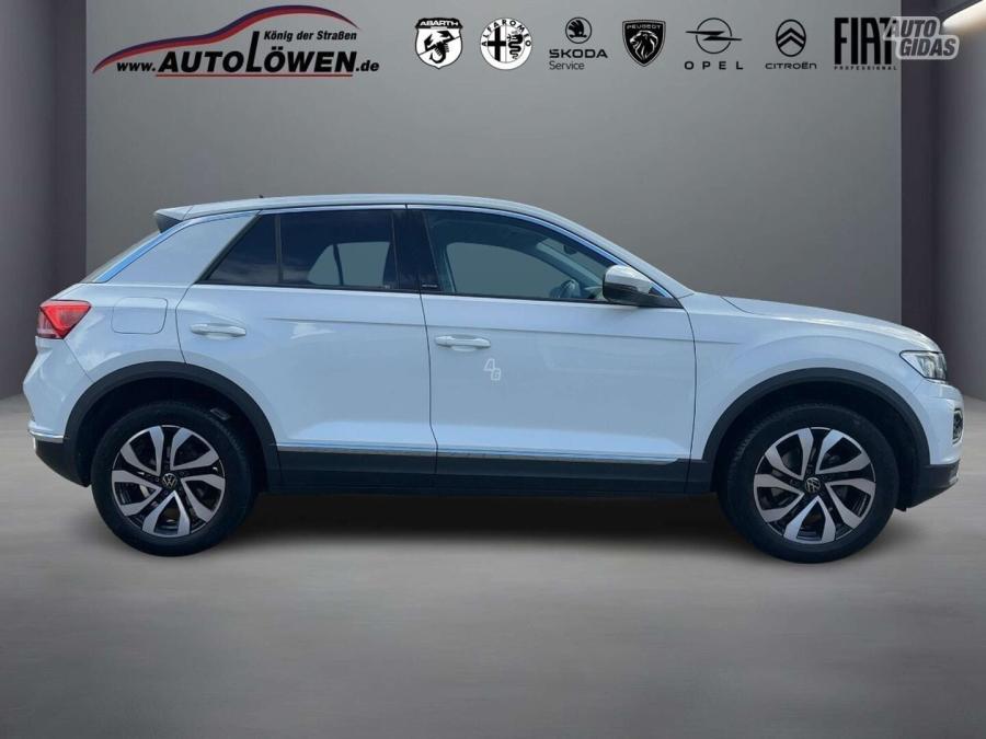 White Volkswagen T-Roc 2022 in Kaunas, with an engine capacity of 1.00 L and mileage of 23 thousand km for 21834 €, photo 5 on AUTOMOTO.COM.LV