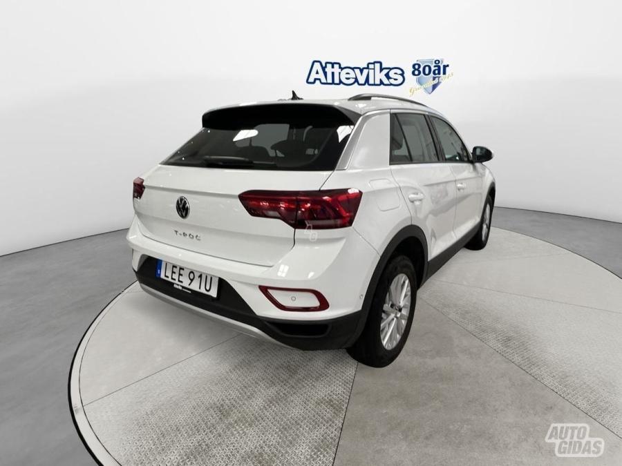 White Volkswagen T-Roc 2023 in Kaunas, with an engine capacity of 0.00 L and mileage of 61 thousand km for 26168 €, photo 3 on AUTOMOTO.COM.LV