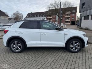 White Volkswagen T-Roc 2023 in Kaunas, with an engine capacity of 1.00 L and mileage of 58 thousand km for 24629 €, photo 4 on AUTOMOTO.COM.LV