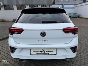 White Volkswagen T-Roc 2023 in Kaunas, with an engine capacity of 1.00 L and mileage of 58 thousand km for 24629 €, photo 5 on AUTOMOTO.COM.LV