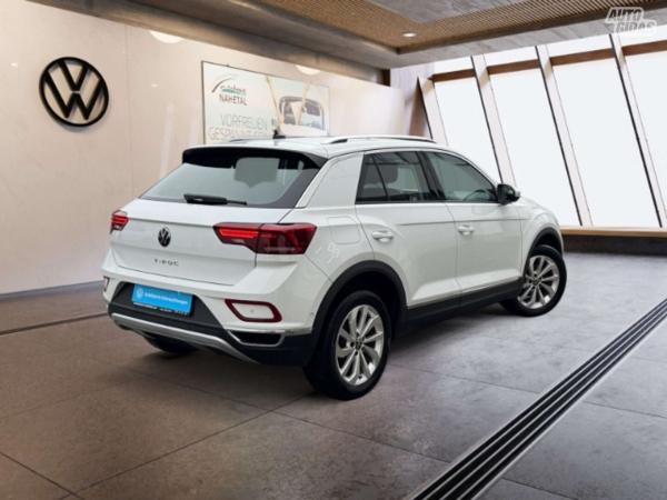 White Volkswagen T-Roc 2023 in Kaunas, with an engine capacity of 2.00 L and mileage of 79 thousand km for 25336 €, photo 5 on AUTOMOTO.COM.LV