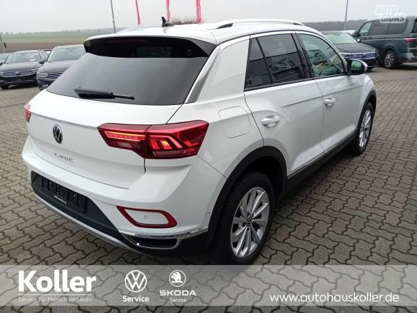 White Volkswagen T-Roc 2023 in Kaunas, with an engine capacity of 2.00 L and mileage of 52 thousand km for 27951 €, photo 4 on AUTOMOTO.COM.LV