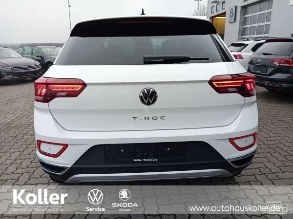 White Volkswagen T-Roc 2023 in Kaunas, with an engine capacity of 2.00 L and mileage of 52 thousand km for 27951 €, photo 5 on AUTOMOTO.COM.LV