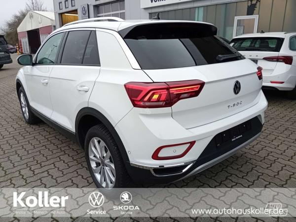 White Volkswagen T-Roc 2023 in Kaunas, with an engine capacity of 2.00 L and mileage of 52 thousand km for 27951 €, photo 6 on AUTOMOTO.COM.LV