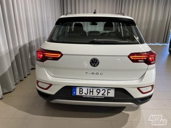 White Volkswagen T-Roc 2023 in Kaunas, with an engine capacity of 0.00 L and mileage of 14 thousand km for 28820 €, photo 5 on AUTOMOTO.COM.LV