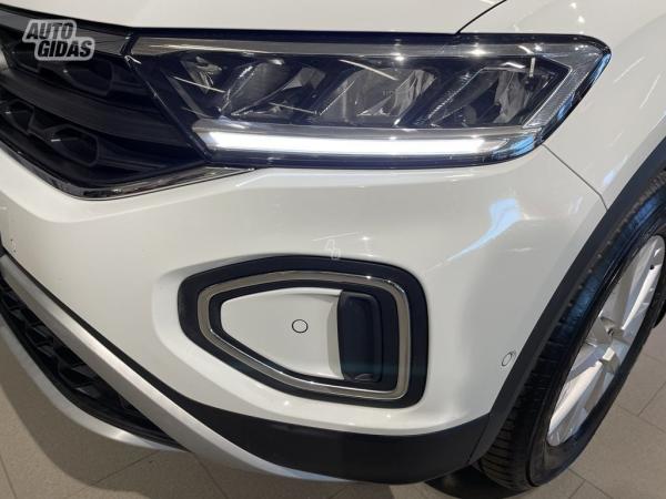 White Volkswagen T-Roc 2023 in Kaunas, with an engine capacity of 0.00 L and mileage of 14 thousand km for 28820 €, photo 7 on AUTOMOTO.COM.LV