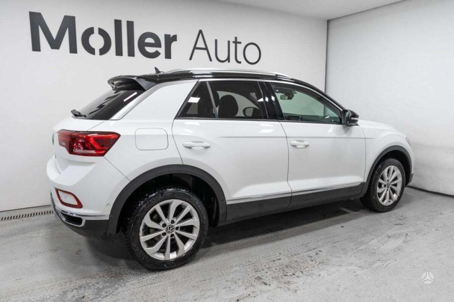 White Volkswagen T-Roc 2023 in Vilnius, with an engine capacity of 1.50 L and mileage of 61 thousand km for 25900 €, photo 4 on AUTOMOTO.COM.LV