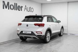 White Volkswagen T-Roc 2023 in Vilnius, with an engine capacity of 1.50 L and mileage of 79 thousand km for 25900 €, photo 3 on AUTOMOTO.COM.LV