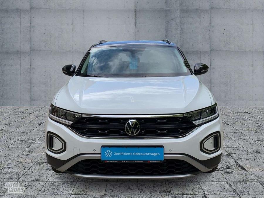 Balts Volkswagen T-Roc 2024 Kauņa, ar dzinēja tilpumu 1.00 L un nobraukumu 23 tūkst. km par 26295 €, foto 3 vietnē AUTOMOTO.COM.LV