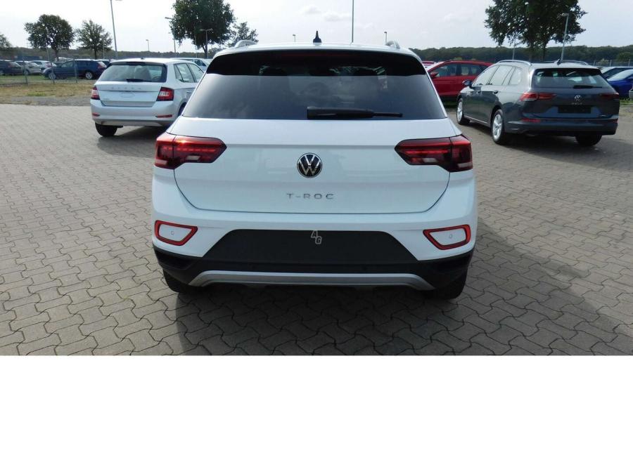 White Volkswagen T-Roc 2024 in Kaunas, with an engine capacity of 1.00 L and mileage of 20 thousand km for 23781 €, photo 4 on AUTOMOTO.COM.LV
