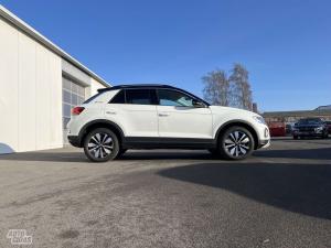 White Volkswagen T-Roc 2025 in Kaunas, with an engine capacity of 2.00 L and mileage of 16 thousand km for 32144 €, photo 4 on AUTOMOTO.COM.LV