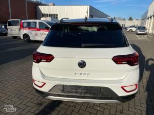 White Volkswagen T-Roc 2025 in Kaunas, with an engine capacity of 2.00 L and mileage of 26 thousand km for 30432 €, photo 6 on AUTOMOTO.COM.LV