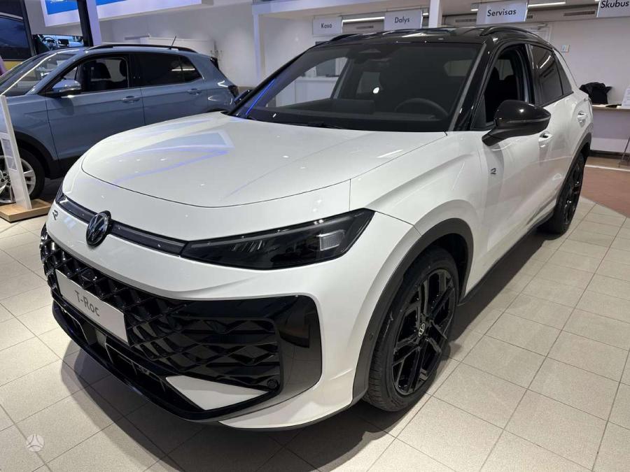 Balts Volkswagen T-Roc 2026 Panevēža, ar dzinēja tilpumu 1.50 L un nobraukumu 10 tūkst. km par 40600 €, foto 1 vietnē AUTOMOTO.COM.LV