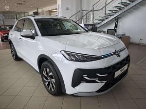 White Volkswagen T-Roc 2026 in Siauliai, with an engine capacity of 1.50 L and mileage of 0 thousand km for 28293 €, photo  on AUTOMOTO.COM.LV