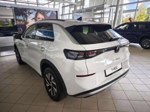 White Volkswagen T-Roc 2026 in Siauliai, with an engine capacity of 1.50 L and mileage of 0 thousand km for 28293 €, photo 4 on AUTOMOTO.COM.LV