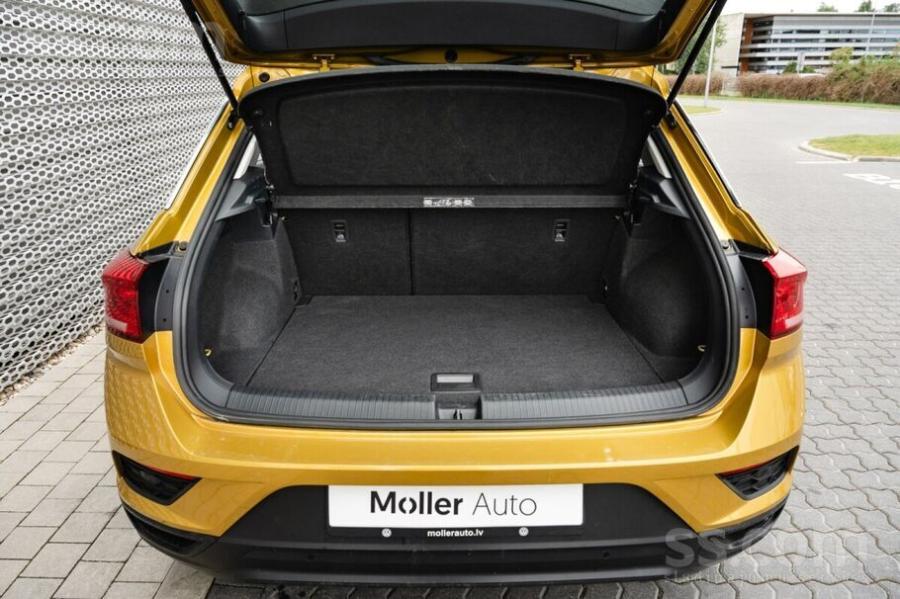 Yellow Volkswagen T-Roc 2021 in Riga, with an engine capacity of 1.00 L and mileage of 76 thousand km for 13950 €, photo 21 on AUTOMOTO.COM.LV
