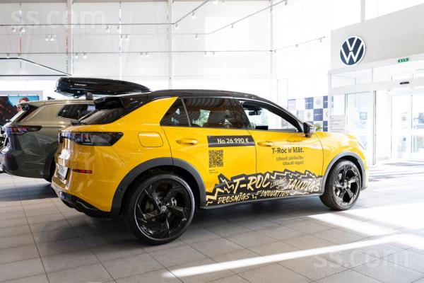 Yellow Volkswagen T-Roc 2026 in Riga, with an engine capacity of 1.50 L and mileage of 0 thousand km for 36600 €, photo 4 on AUTOMOTO.COM.LV